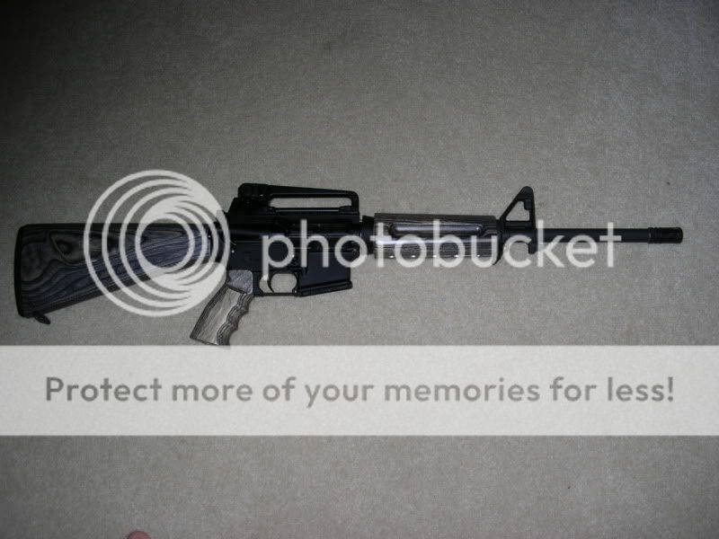 Just converted a fudd by showing him a walnut and case hardened AR ...