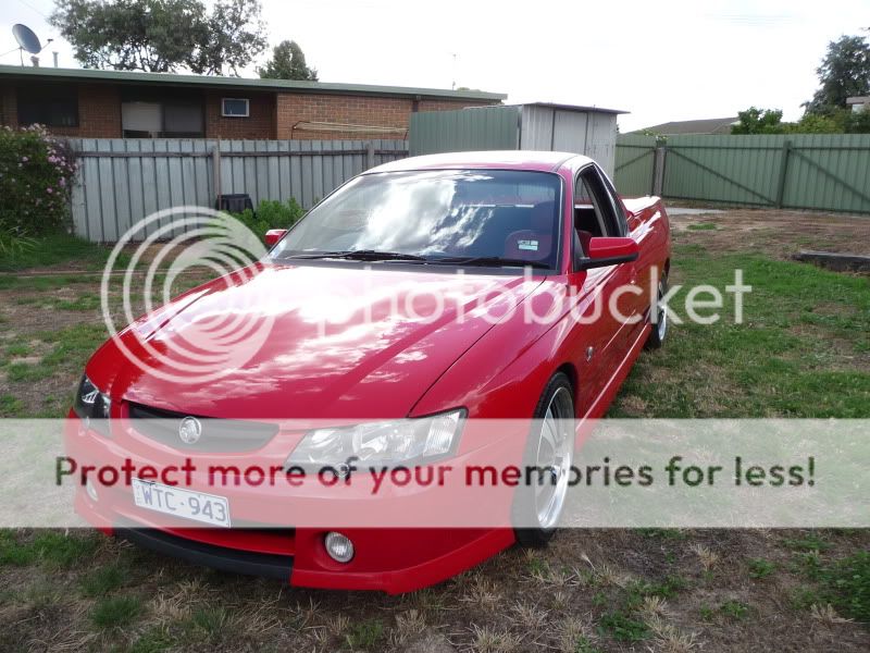 FS: VY SS ute, manual, red leather, hard lid 69k kms