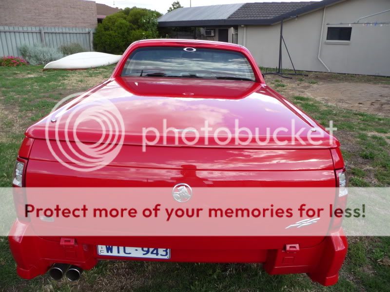 FS: VY SS ute, manual, red leather, hard lid 69k kms