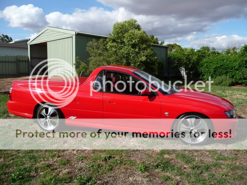 FS: VY SS ute, manual, red leather, hard lid 69k kms