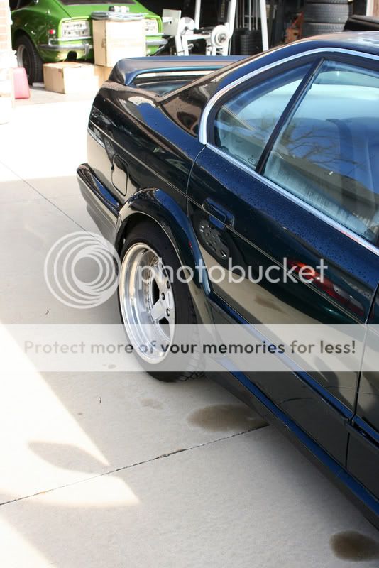E34 with fender flares...pictures?