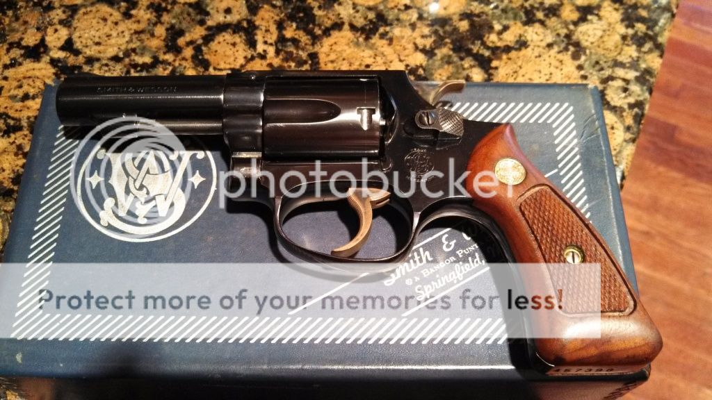 Wow... 48 years old and a gutter sight and still an accurate gun...S&W ...