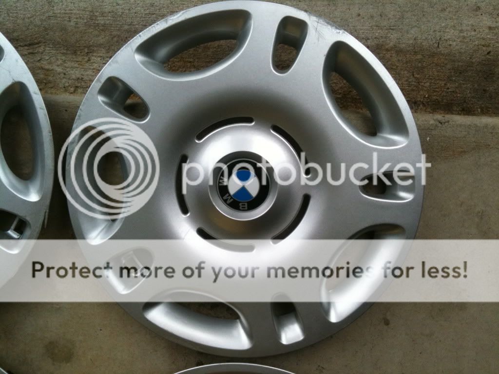 E36 15" OEM BMW Wheel Covers.