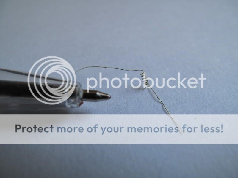 Tiny Gold Spring Solution If Lost. (Frogman pics) | WatchUSeek Watch Forums