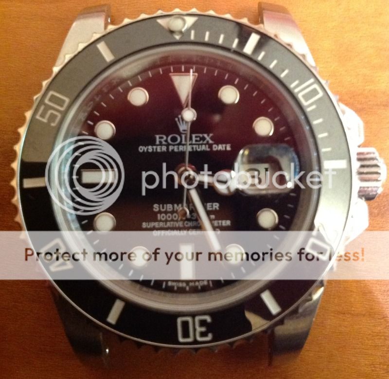 Another FAKE Rolex sold by a "buy-back" store.....now with warranty card