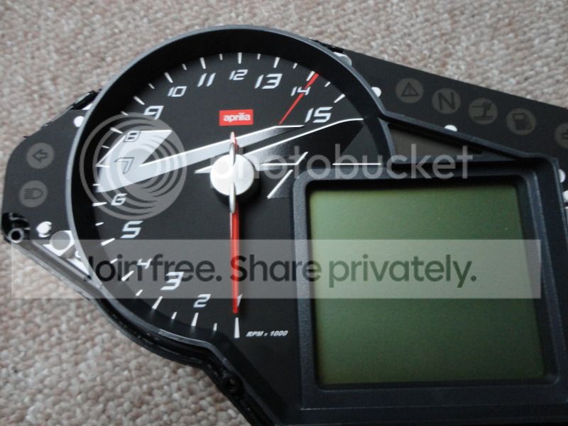 Repairing my wayward tacho needle by disassembling the clocks (pics)